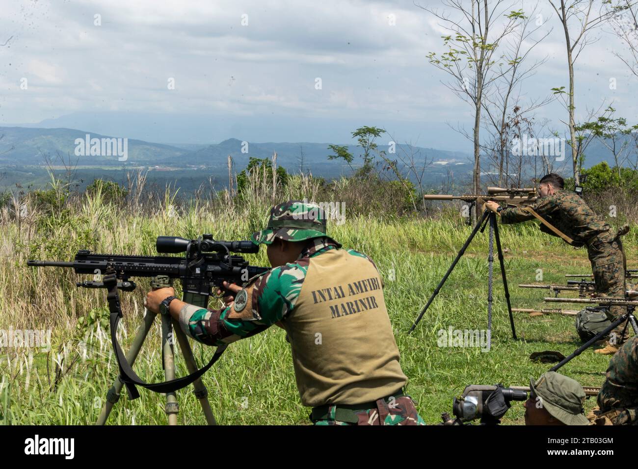 An Indonesian marine with 4th Marine Infantry Brigade, Pasmar 1, fires ...