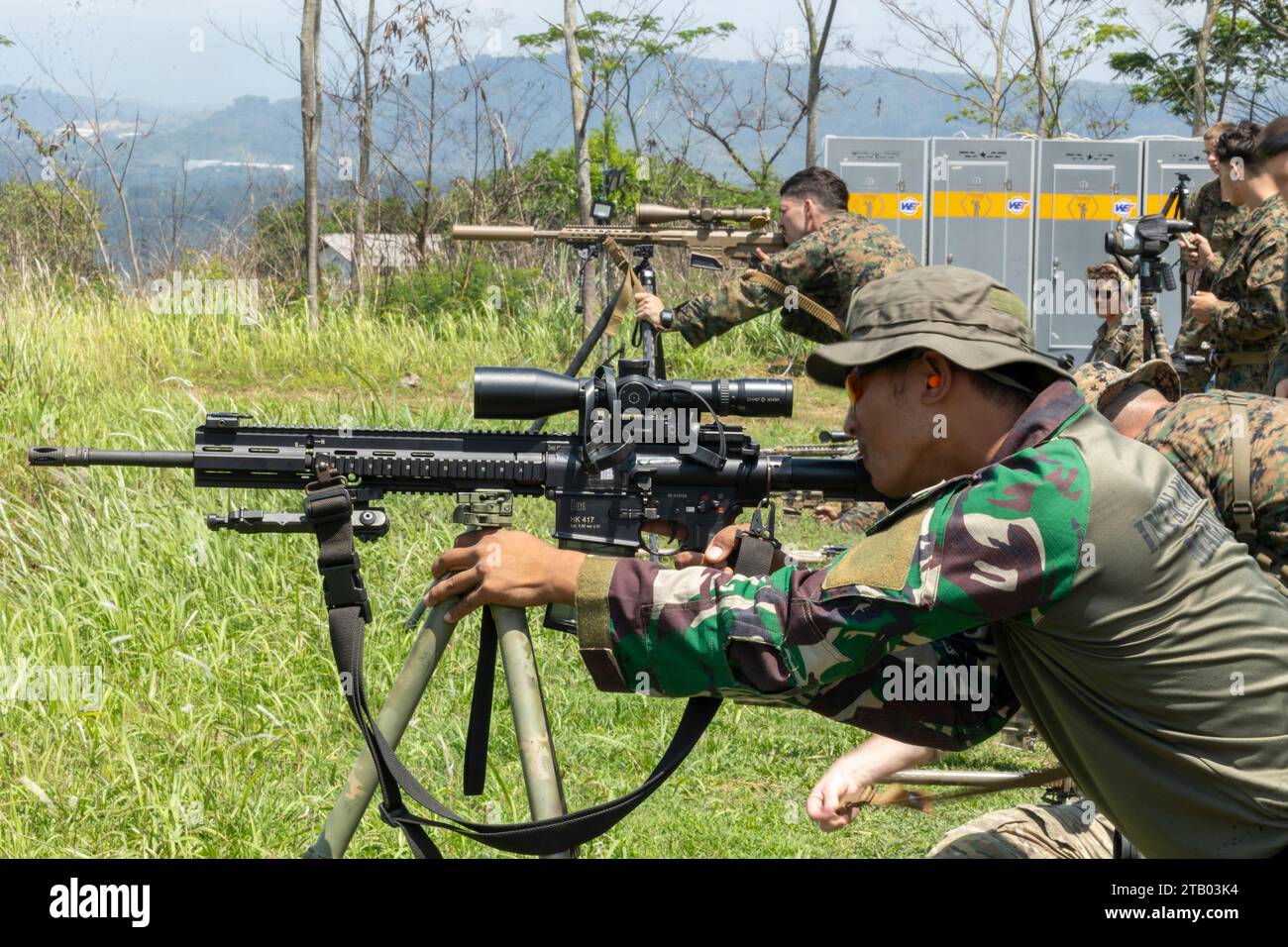 An Indonesian marine with 4th Marine Infantry Brigade, Pasmar 1, sights ...