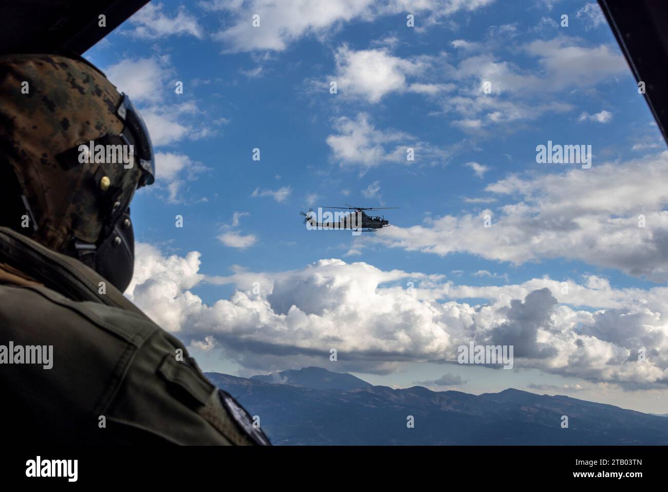 U.S. Marines with Marine Light Attack Helicopter Squadron (HMLA) 369 ...