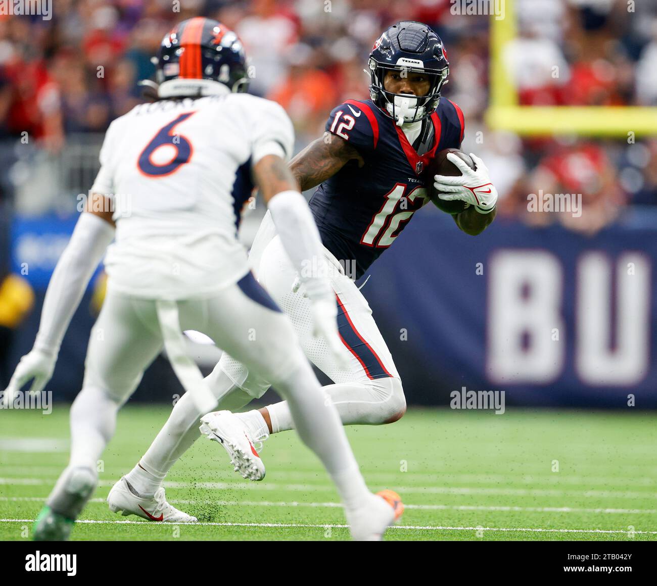 December 3, 2023: Texans wide receiver Nico Collins (12) carries the ...