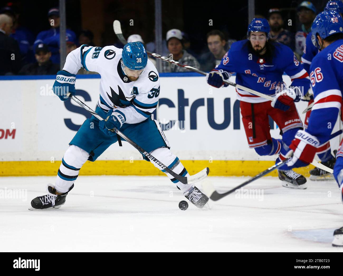 San Jose Sharks defenseman Mario Ferraro controls the puck with New ...