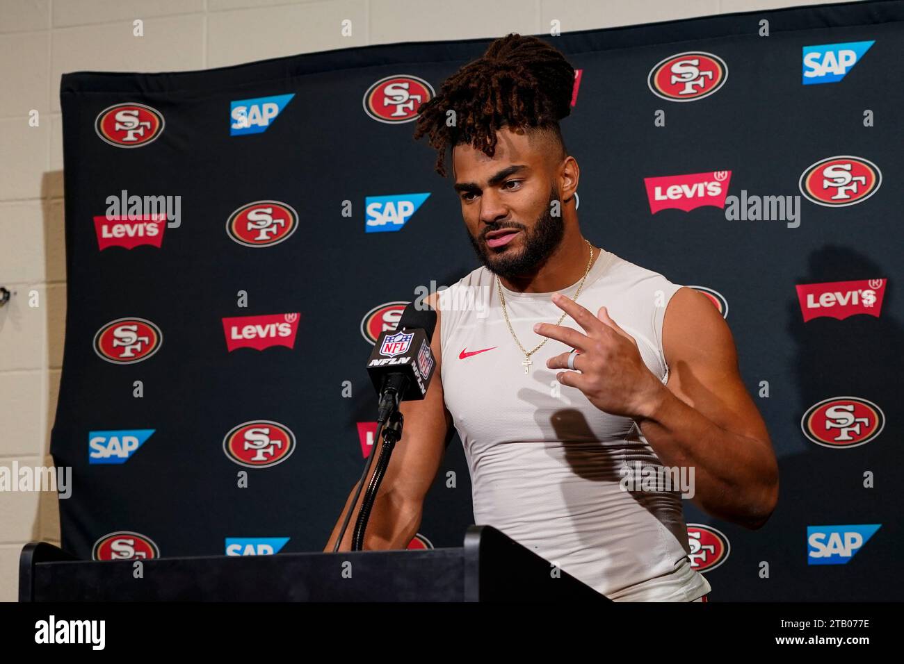 San Francisco 49ers linebacker Fred Warner talks to reporters following ...