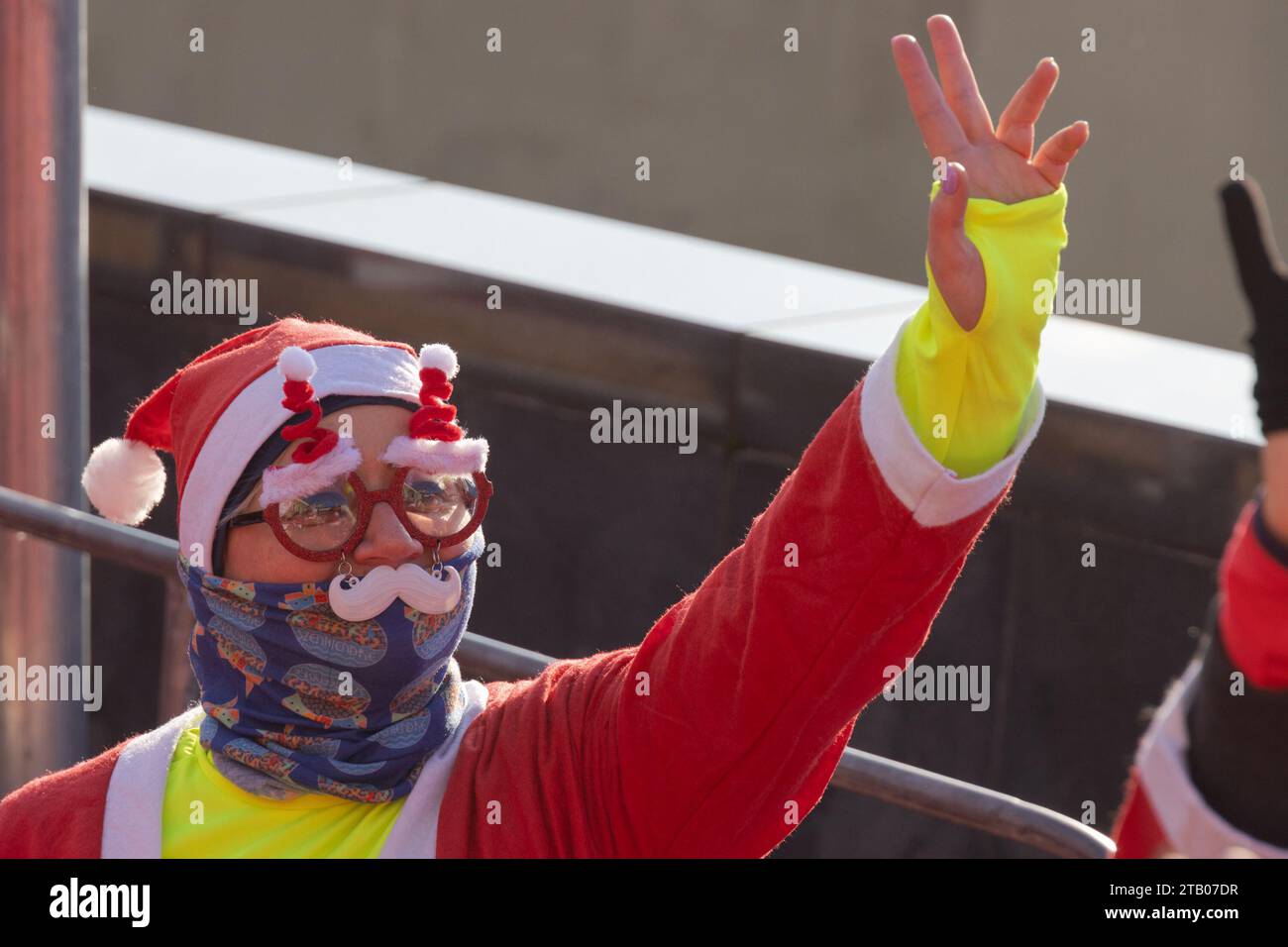 Budapest. 3rd Dec, 2023. A woman in Santa Claus costume participates in ...