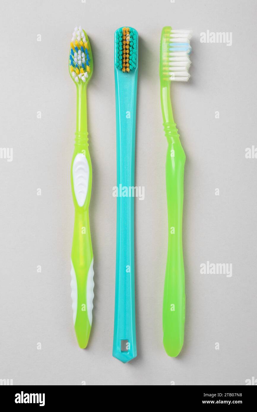Many different toothbrushes on light background, flat lay Stock Photo ...