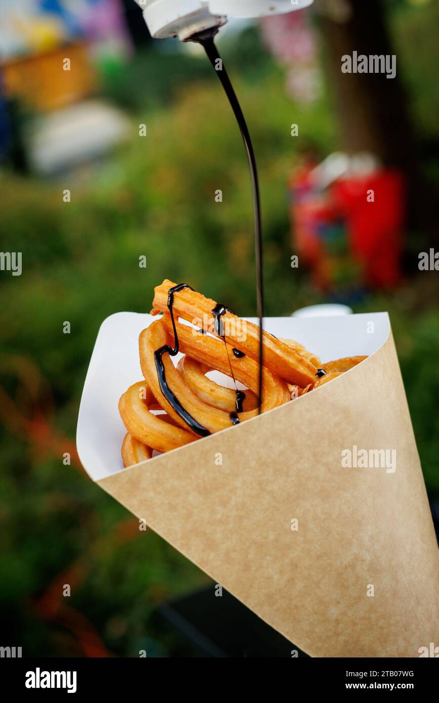 Enjoy a sweet treat with these crispy churros dipped in chocolate sauce ...