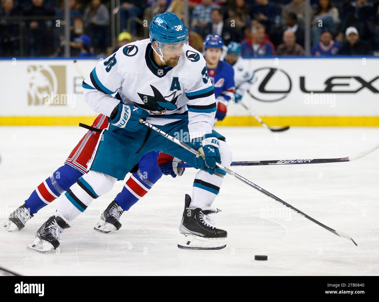 San Jose Sharks defenseman Mario Ferraro (38) controls the puck during ...