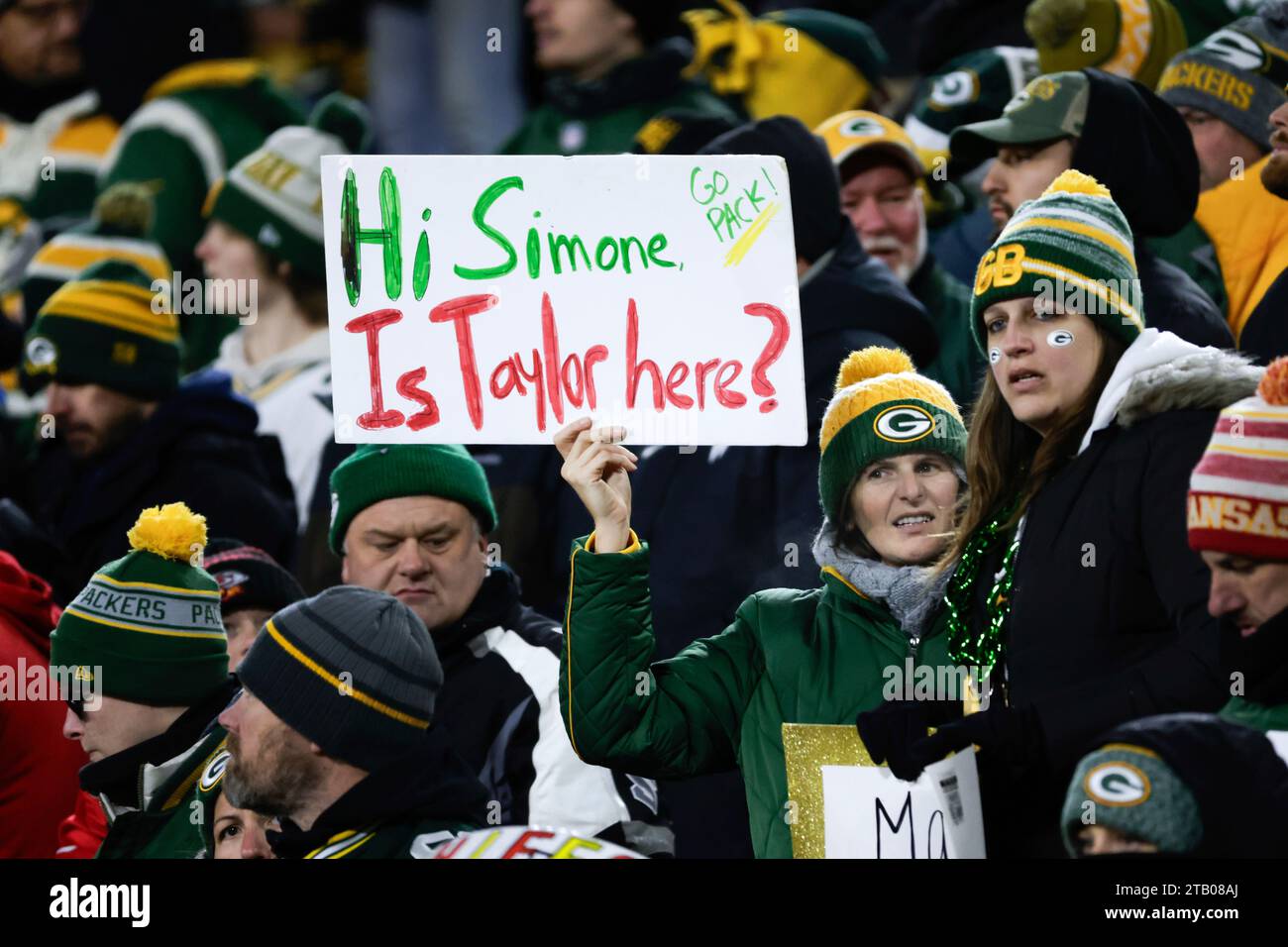 A Green Bay Packers fan holds up a sign during the first half of an NFL ...