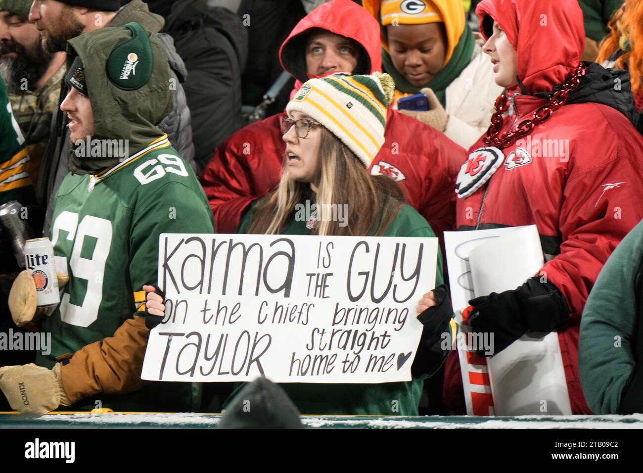 A Green Bay Packers fan holds a sign during the first half of an NFL ...