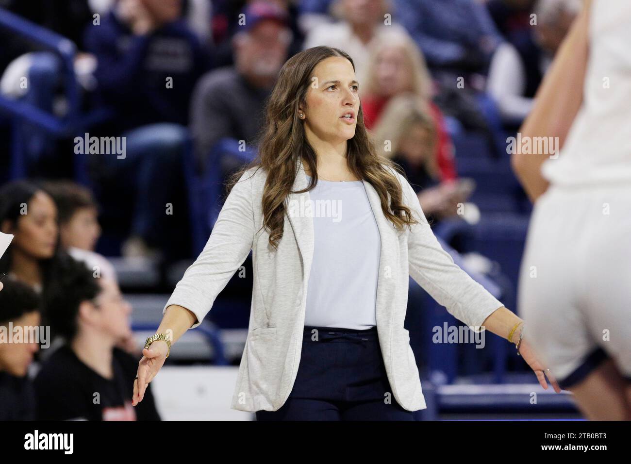 Gonzaga head coach Lisa Fortier gathers her team during a break in play ...