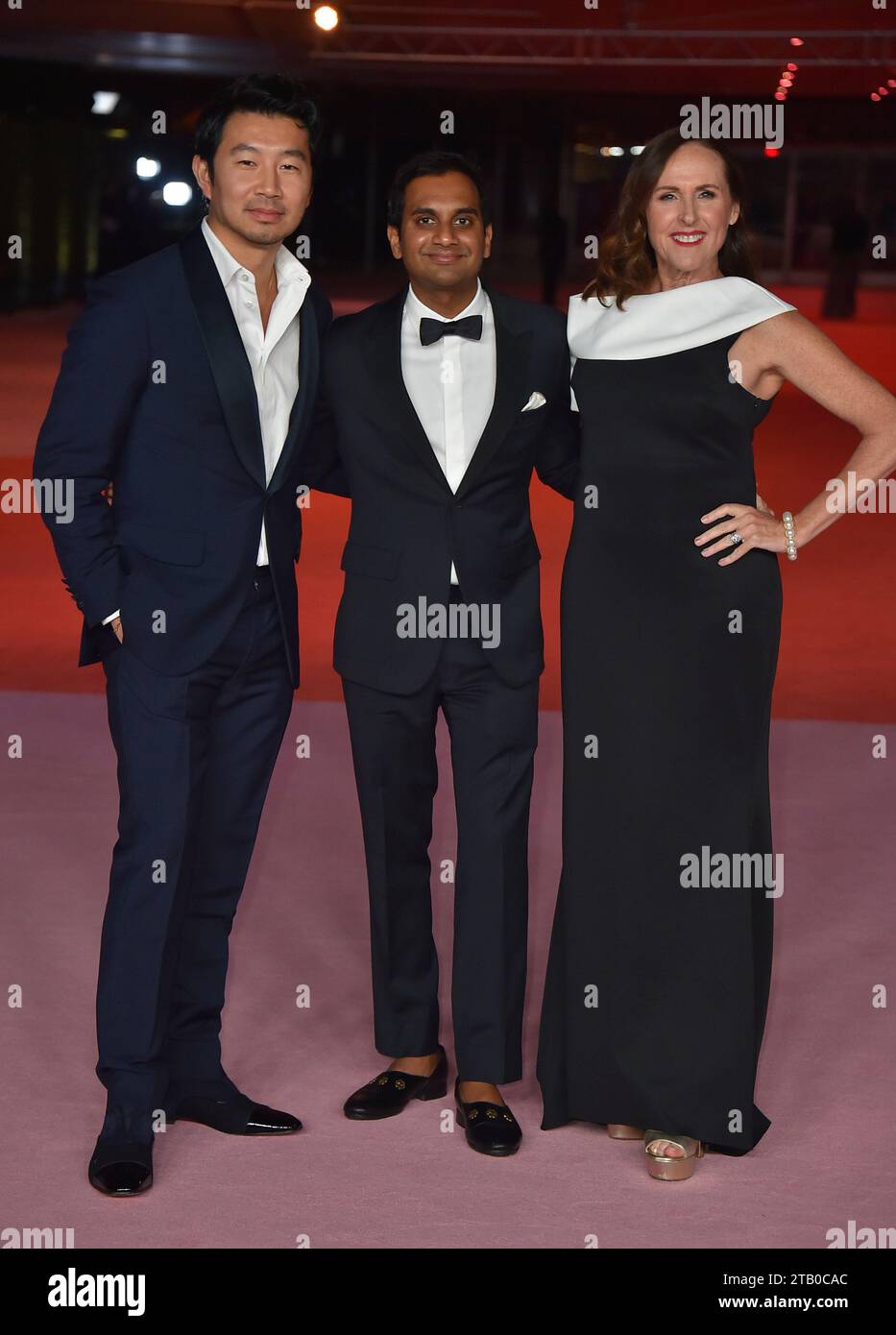 Simu Liu, from left, Aziz Ansari, and Molly Shannon attend the third annual Academy Museum gala ...