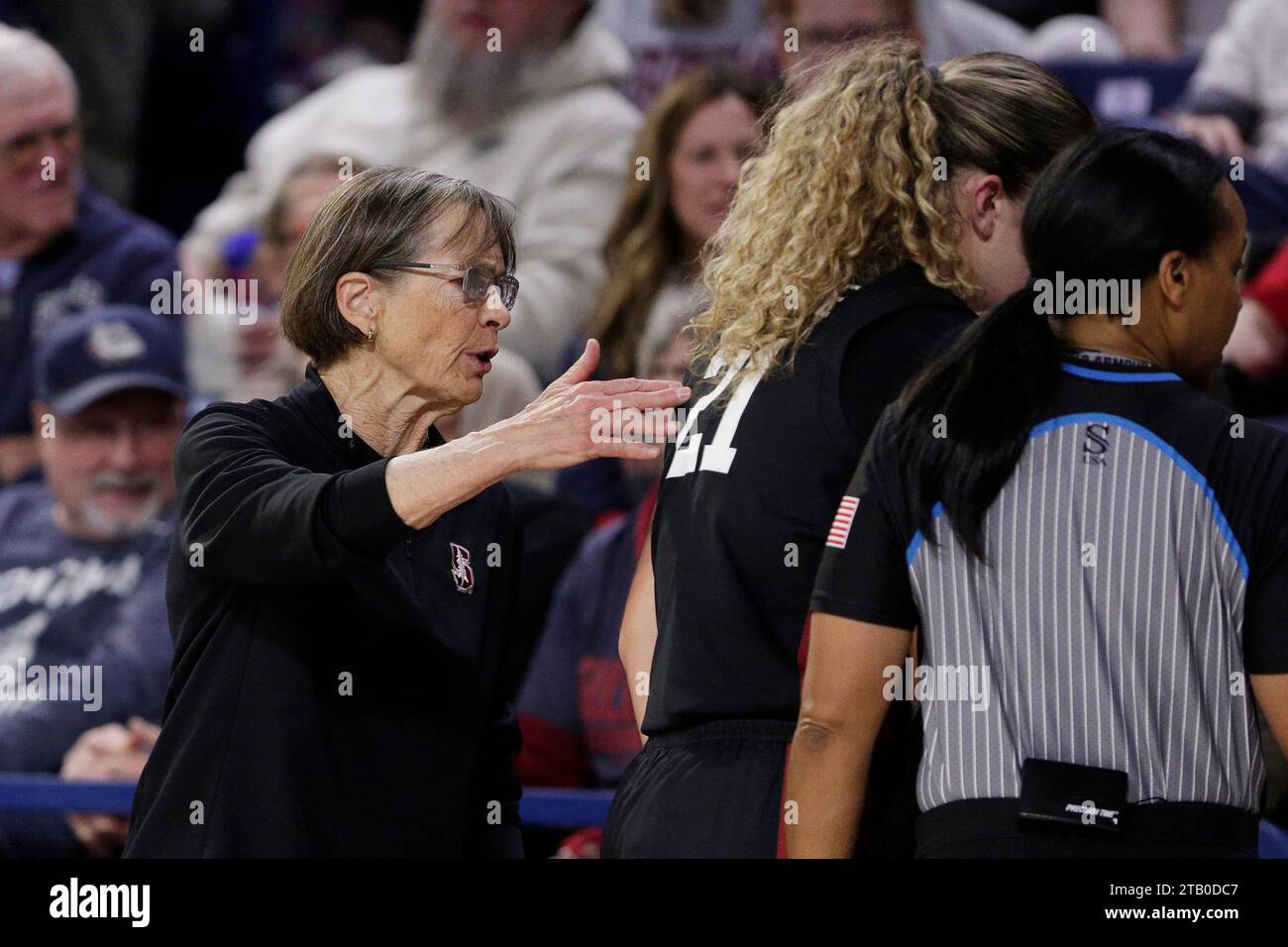 Stanford head coach Tara VanDerveer, left, speaks with forward Brooke Demetre (21) during the ...
