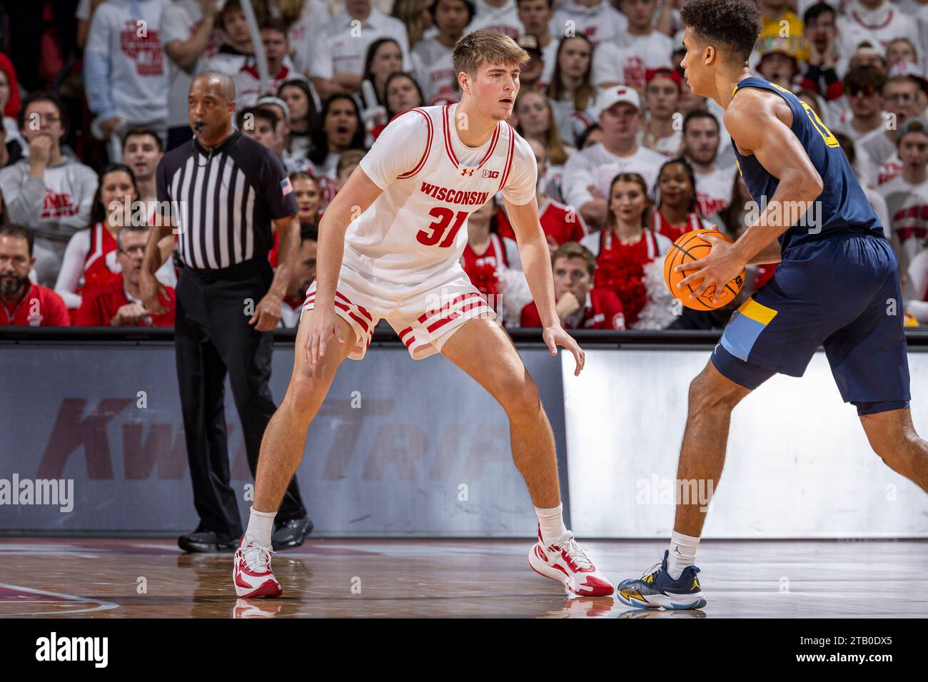 Wisconsin Badgers forward Nolan Winter (31) defends during an NCAA ...