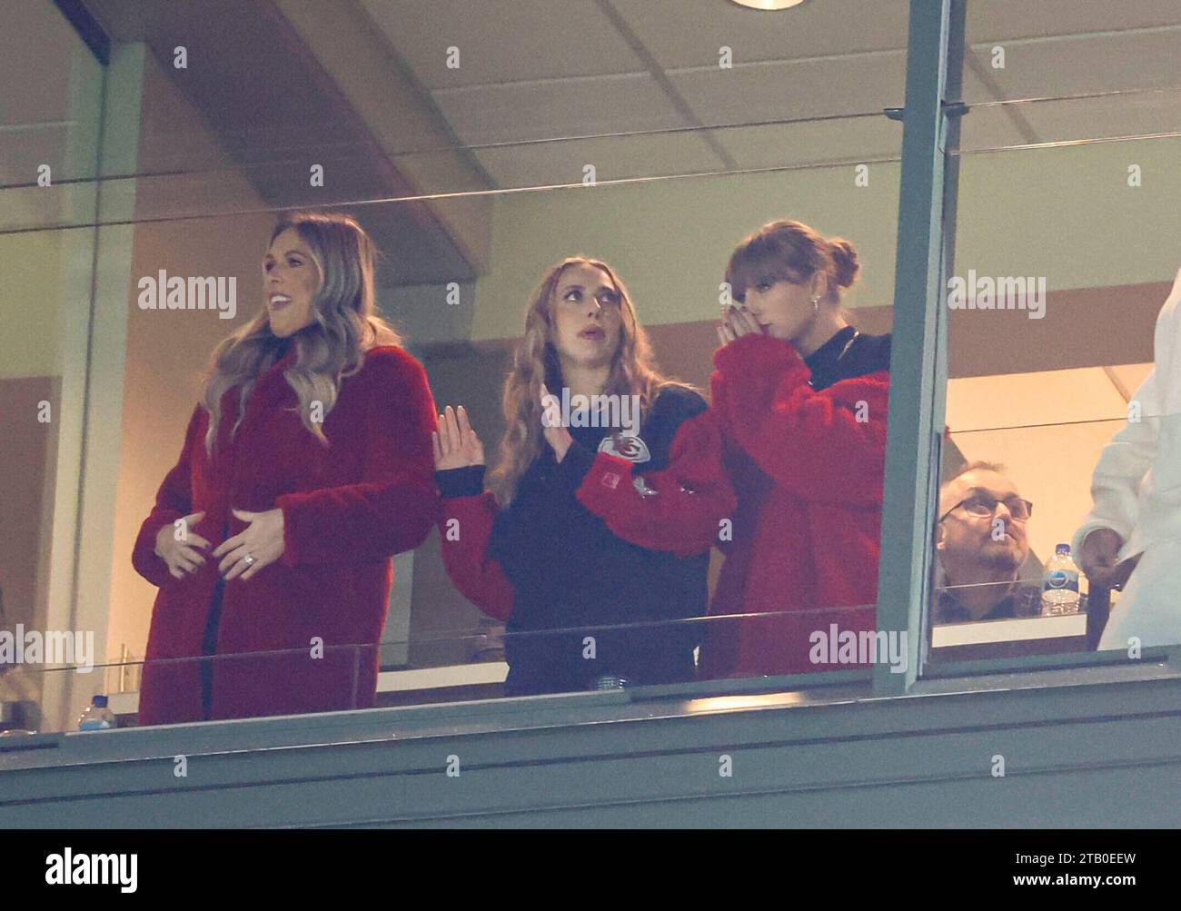 Taylor Swift, right reacts during an NFL football game between the ...