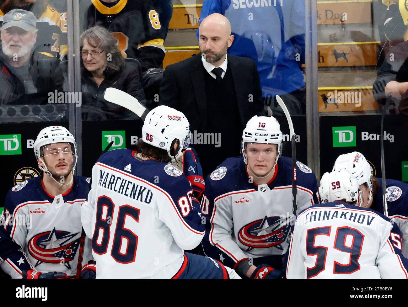 Columbus Blue Jackets head coach Pascal Vincent, top center, looks on ...