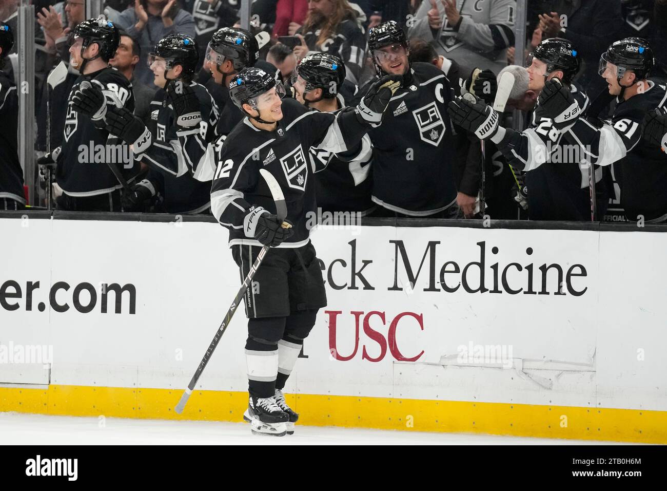 Los Angeles Kings center Trevor Moore (12) celebrates with teammates ...