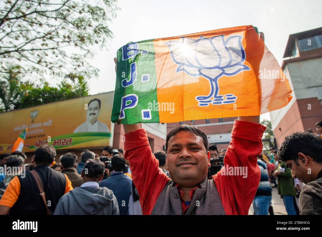 New Delhi, India. 03rd Dec, 2023. A BJP supporter seen waving the party ...