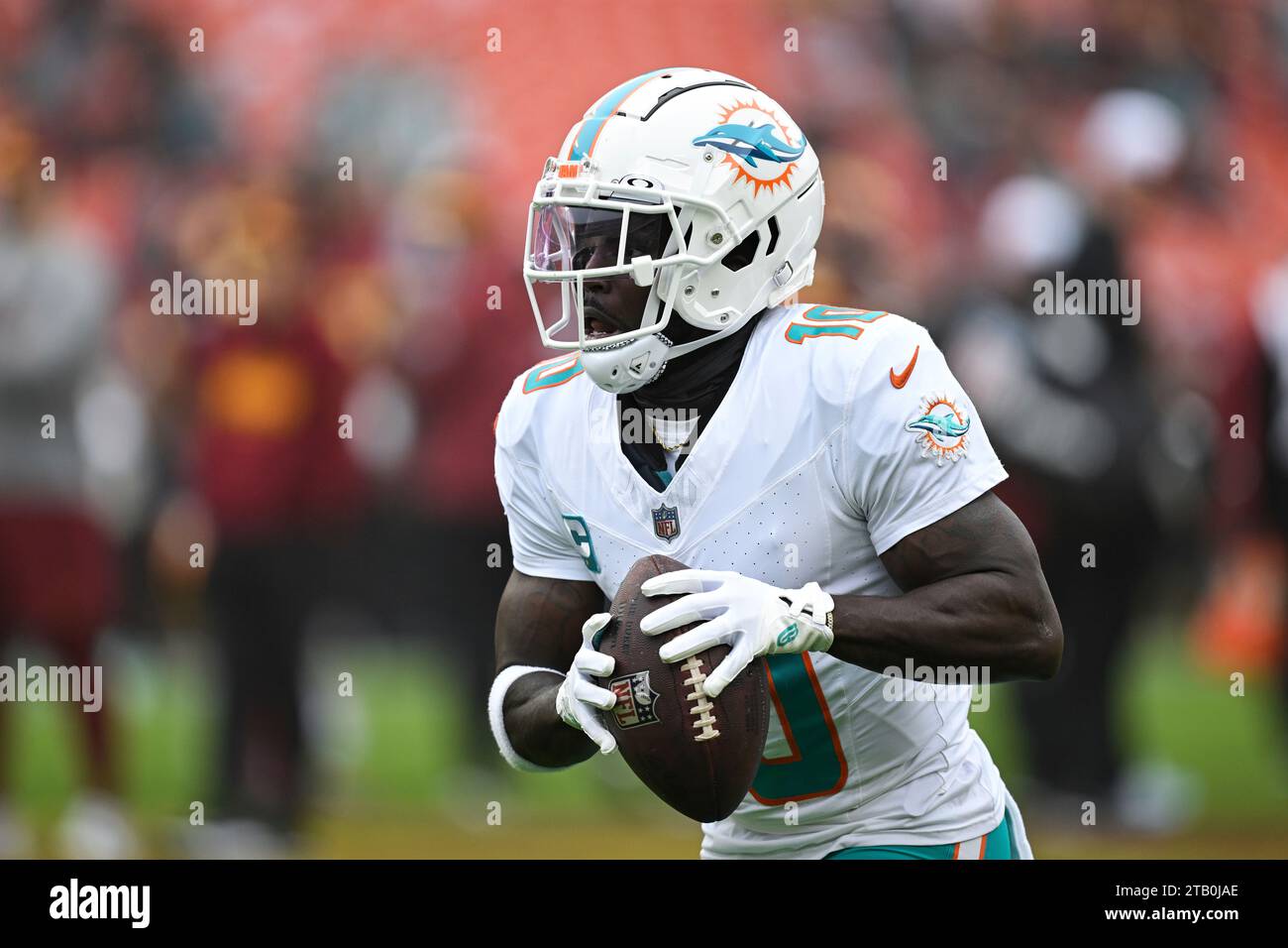 Miami Dolphins wide receiver Tyreek Hill (10) works out during pre-game ...
