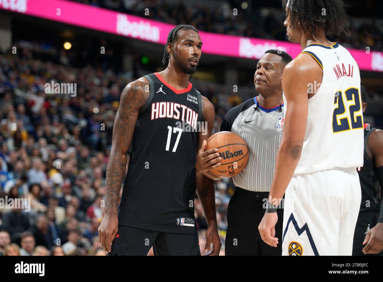 Houston Rockets forward Tari Eason (17) exchanges words with Denver ...
