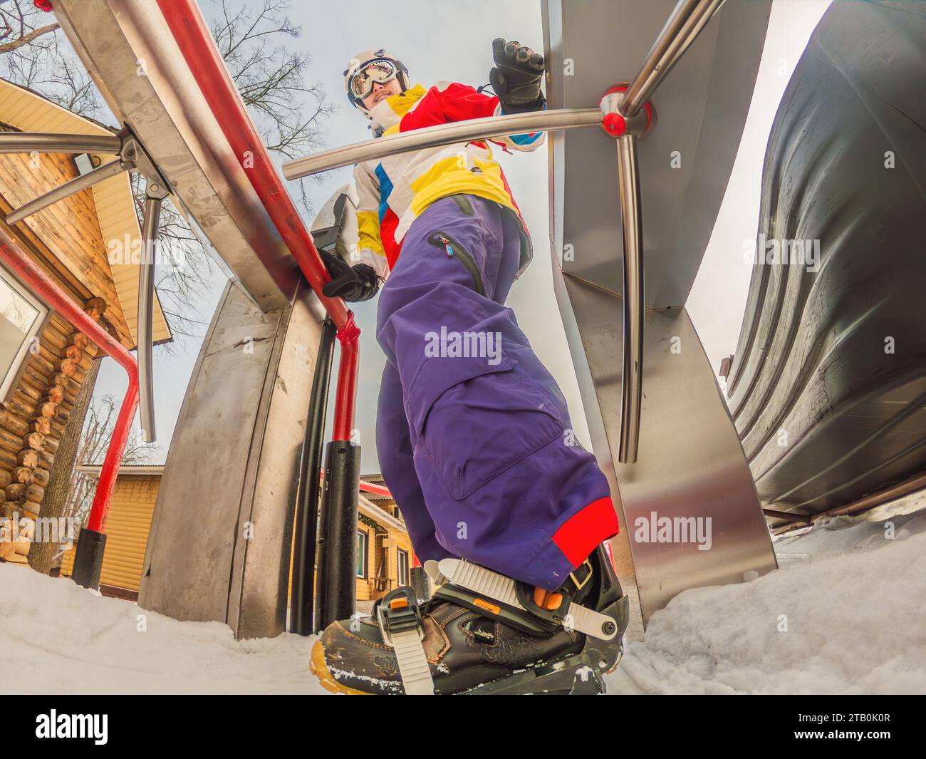 A daring man conquers snowy slopes with style, showcasing skill and ...