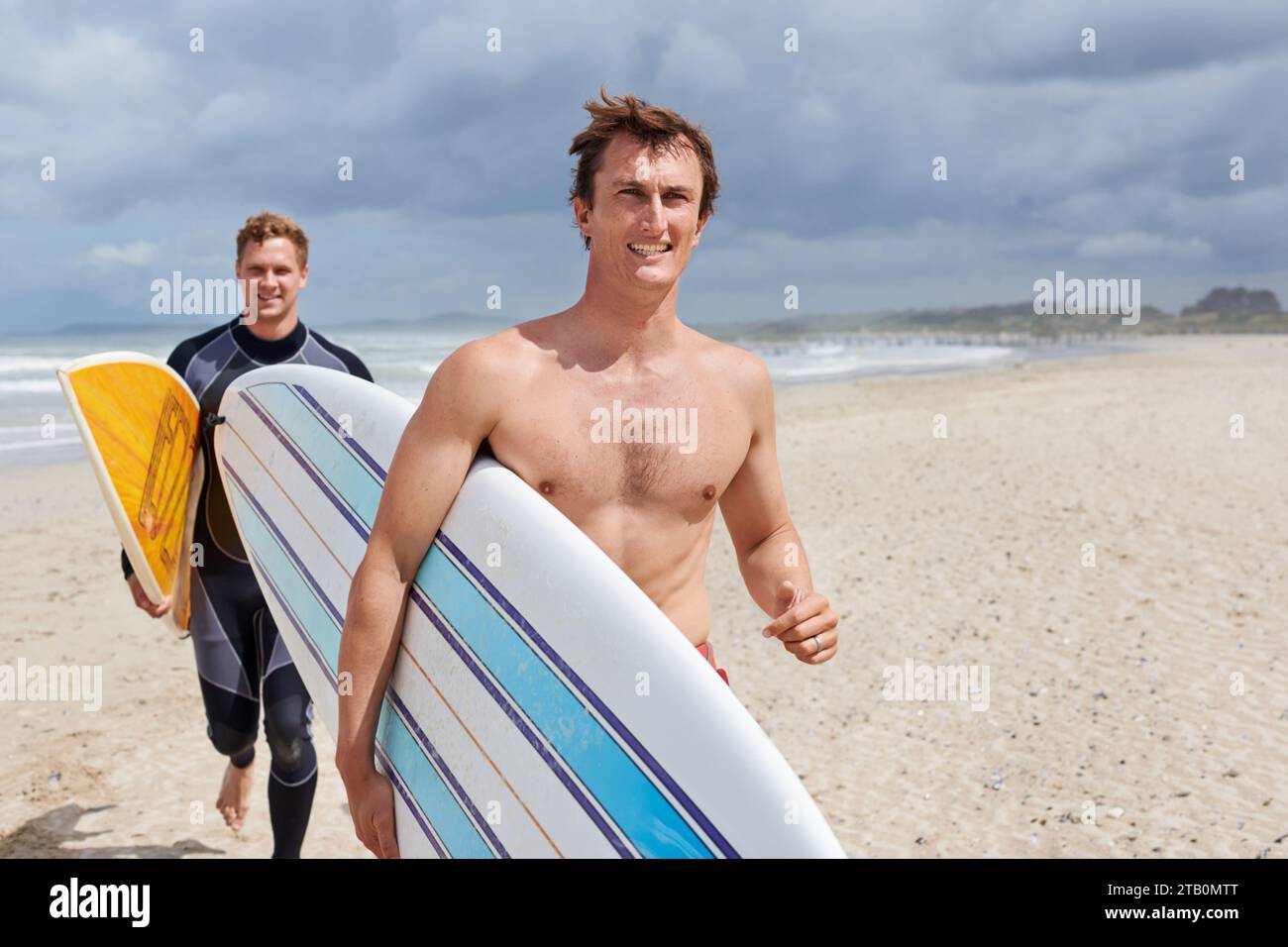Happy surfer friends beach in hi-res stock photography and images - Alamy