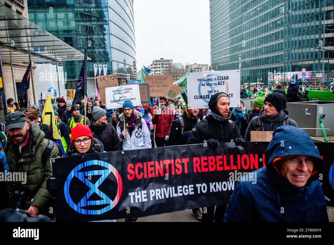 Protesters from the Scientist rebellion are seen marching with a big ...