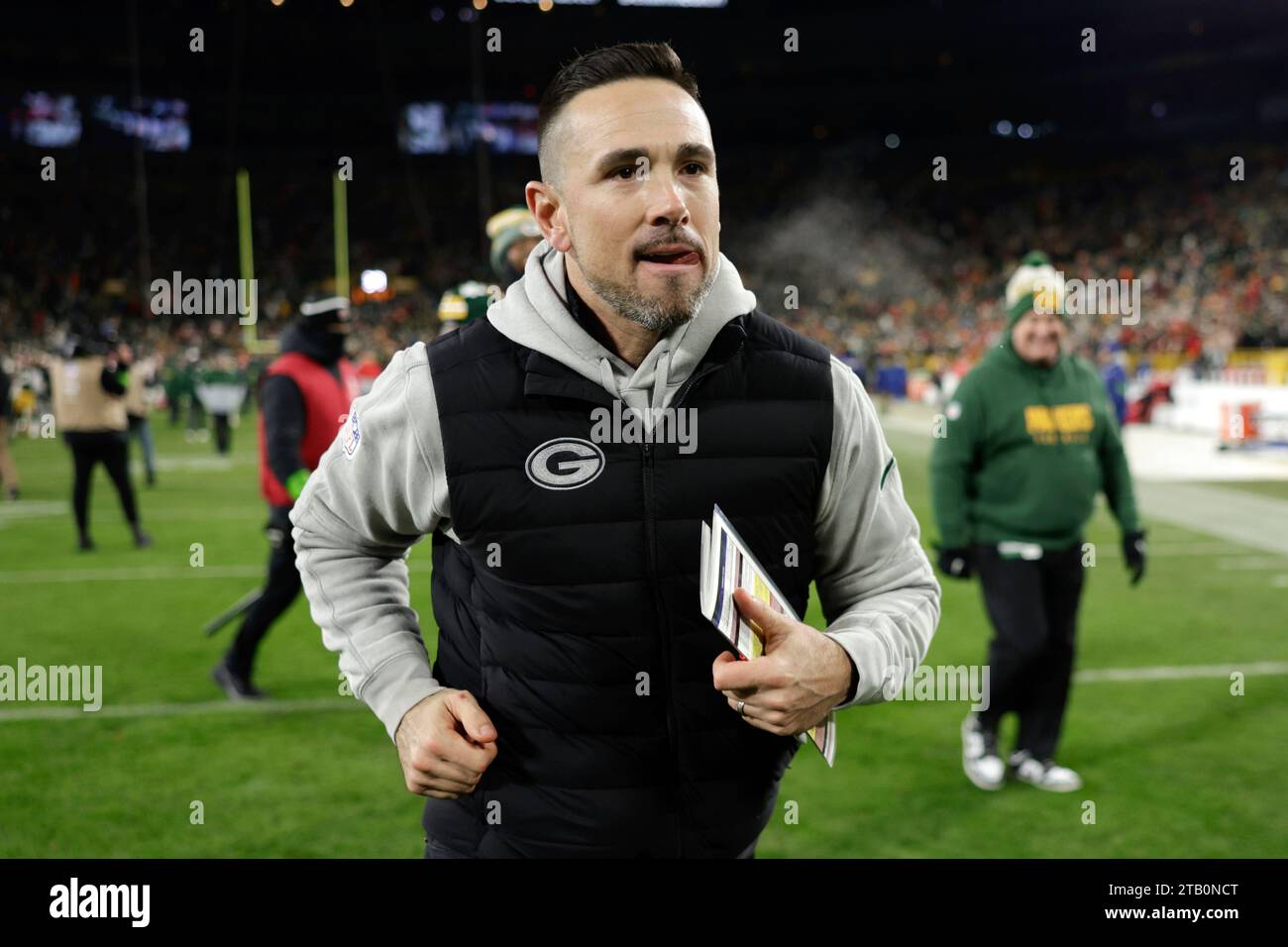 Green Bay Packers head coach Matt LaFleur runs off the field after an ...