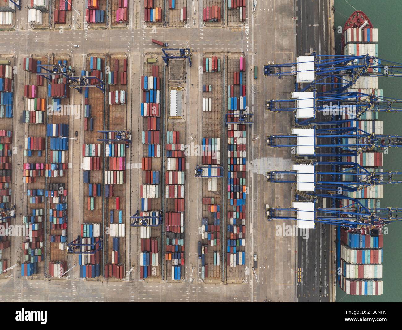 Aerial top view of Container ship loading and unloading, Cargo ...