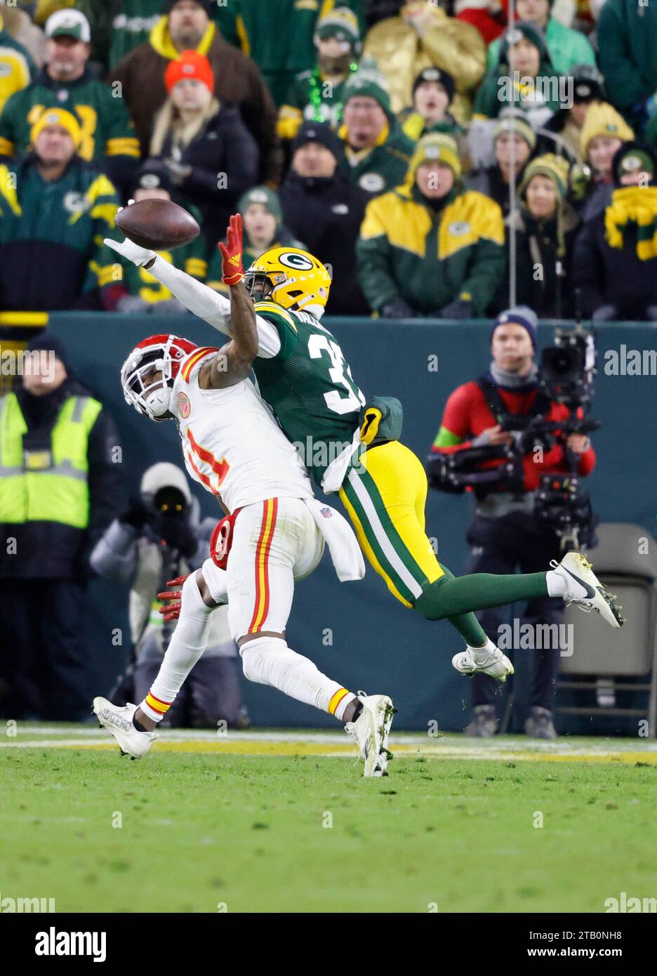 Green Bay Packers' Carrington Valentine, right breaks up a pass to ...