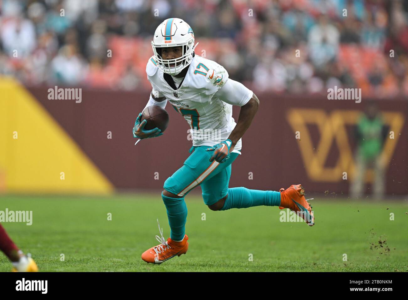 Miami Dolphins wide receiver Jaylen Waddle (17) runs with the ball ...