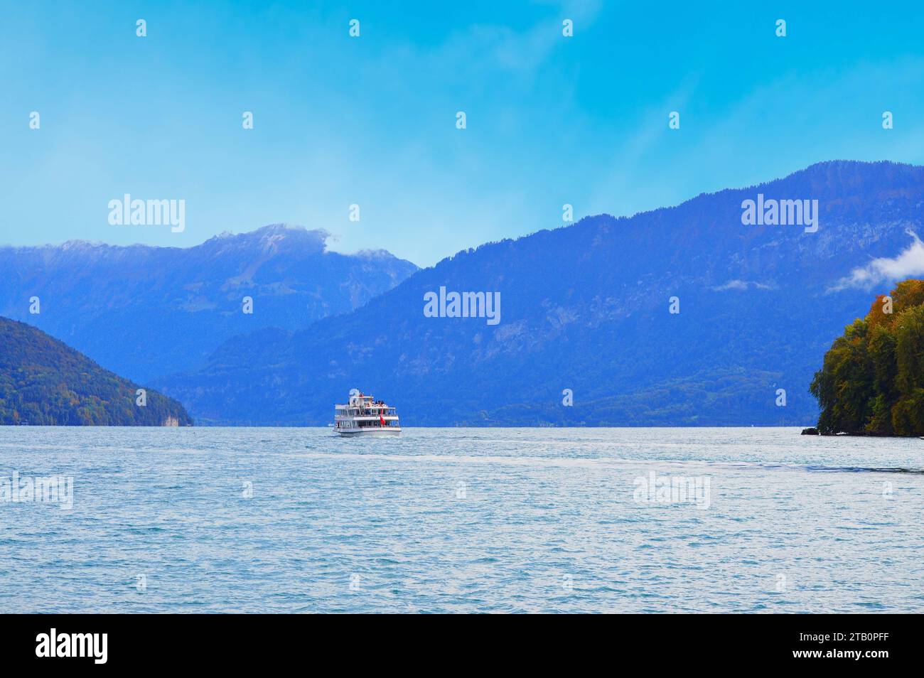 White touring boat in the lake of Interlaken Stock Photo - Alamy