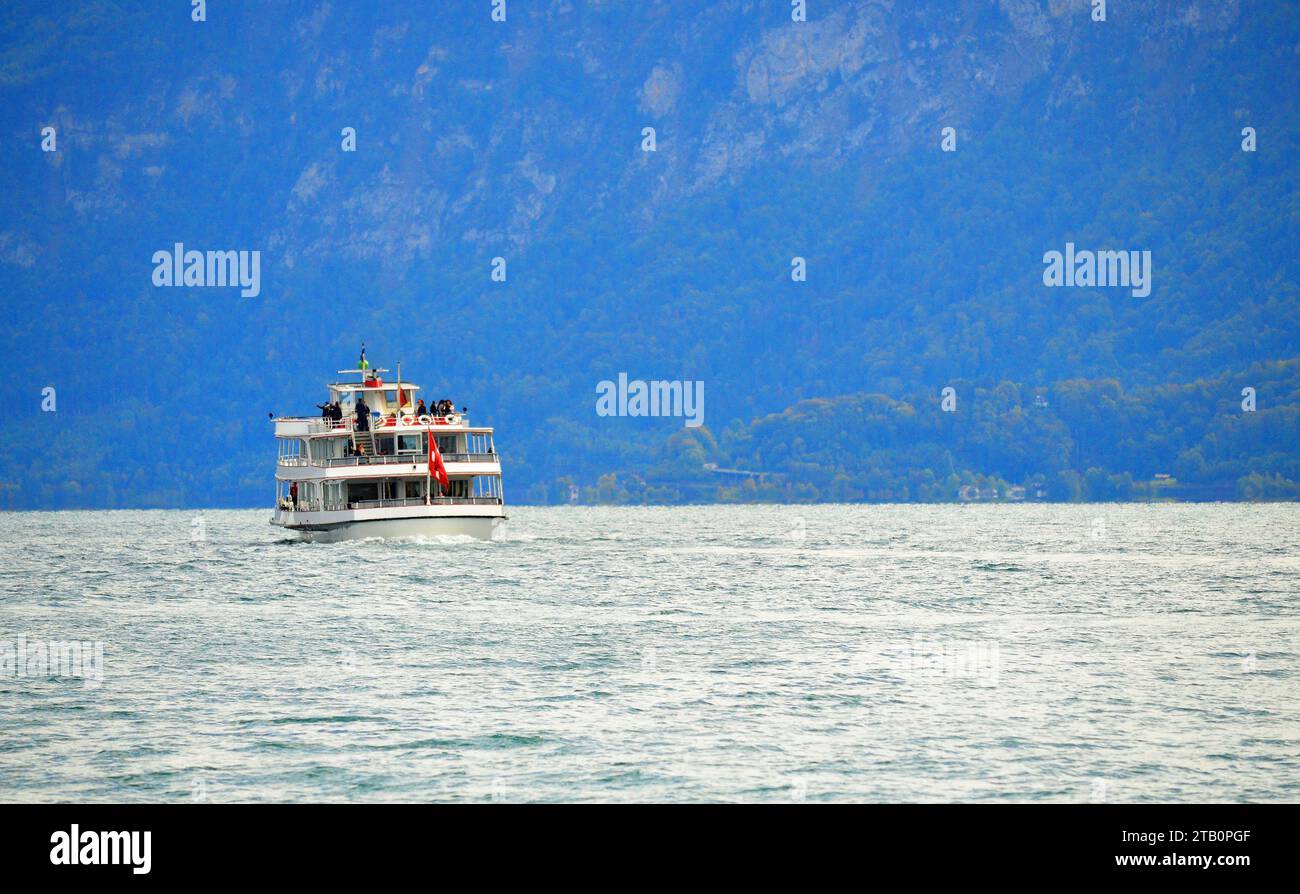 white touring boat in Interlaken lake Stock Photo - Alamy