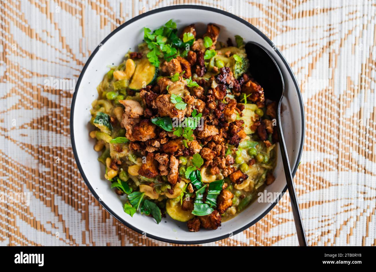 plant-based green curry with cashew and tofu chunks, healthy vegan food ...