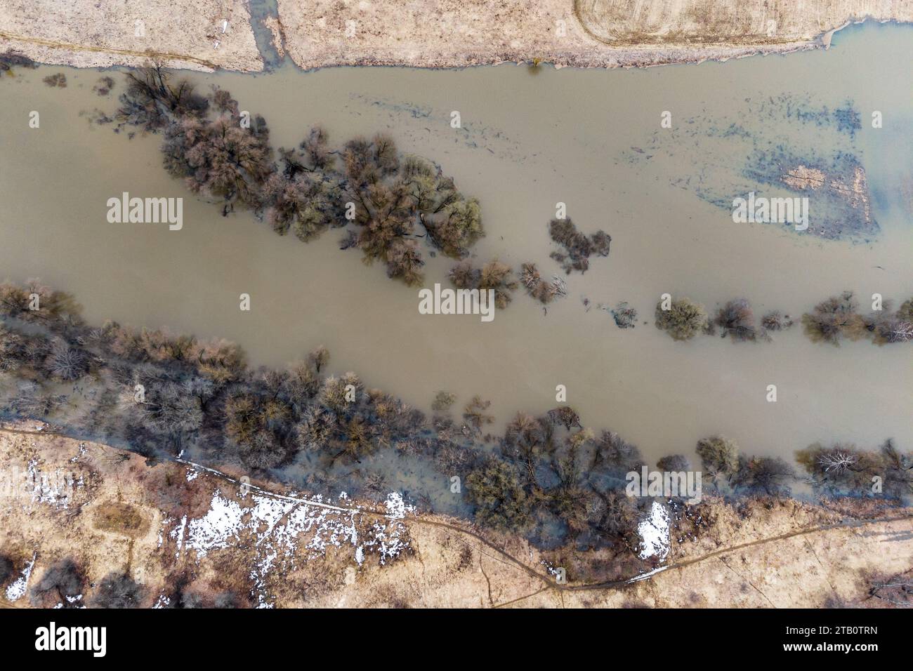 A river overflowing its banks during the spring flood, aerial view Stock Photo - Alamy