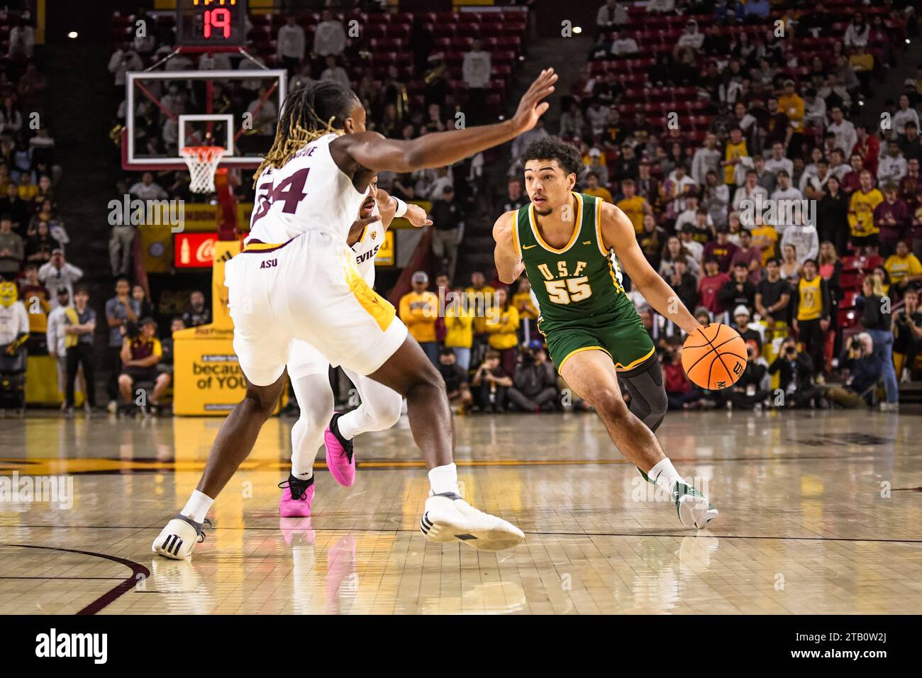 San Francisco Dons guard Marcus Williams (55) drives towards the basket ...