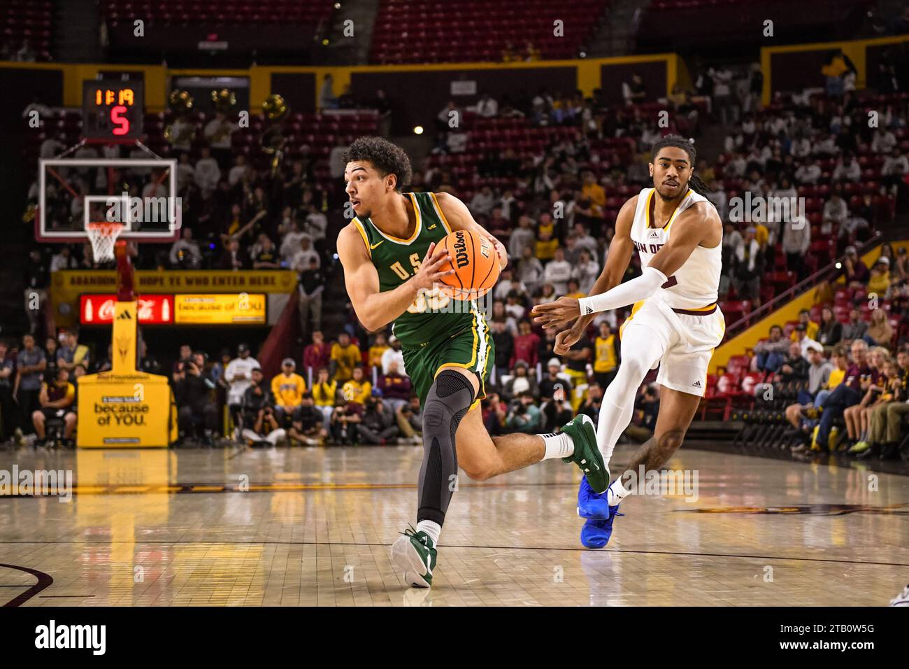 San Francisco Dons guard Marcus Williams (55) drives towards the basket ...