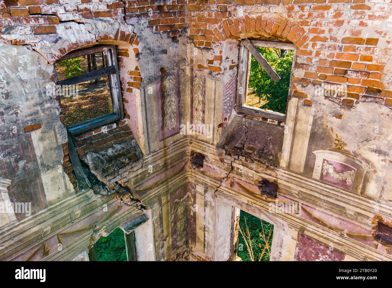 The ruins of an ancient manor house with paintings on the interior ...