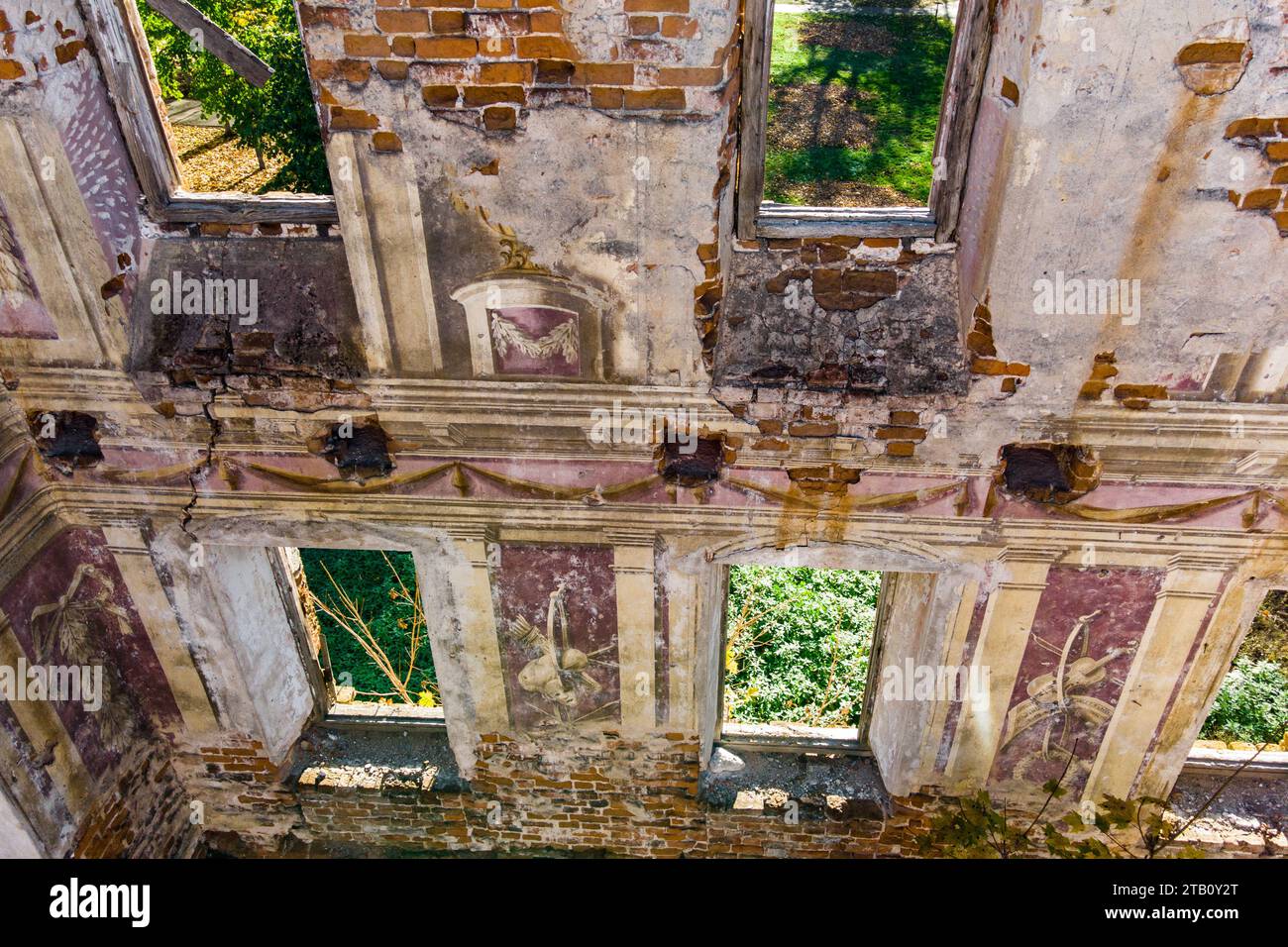 The ruins of an ancient manor house with paintings on the interior ...