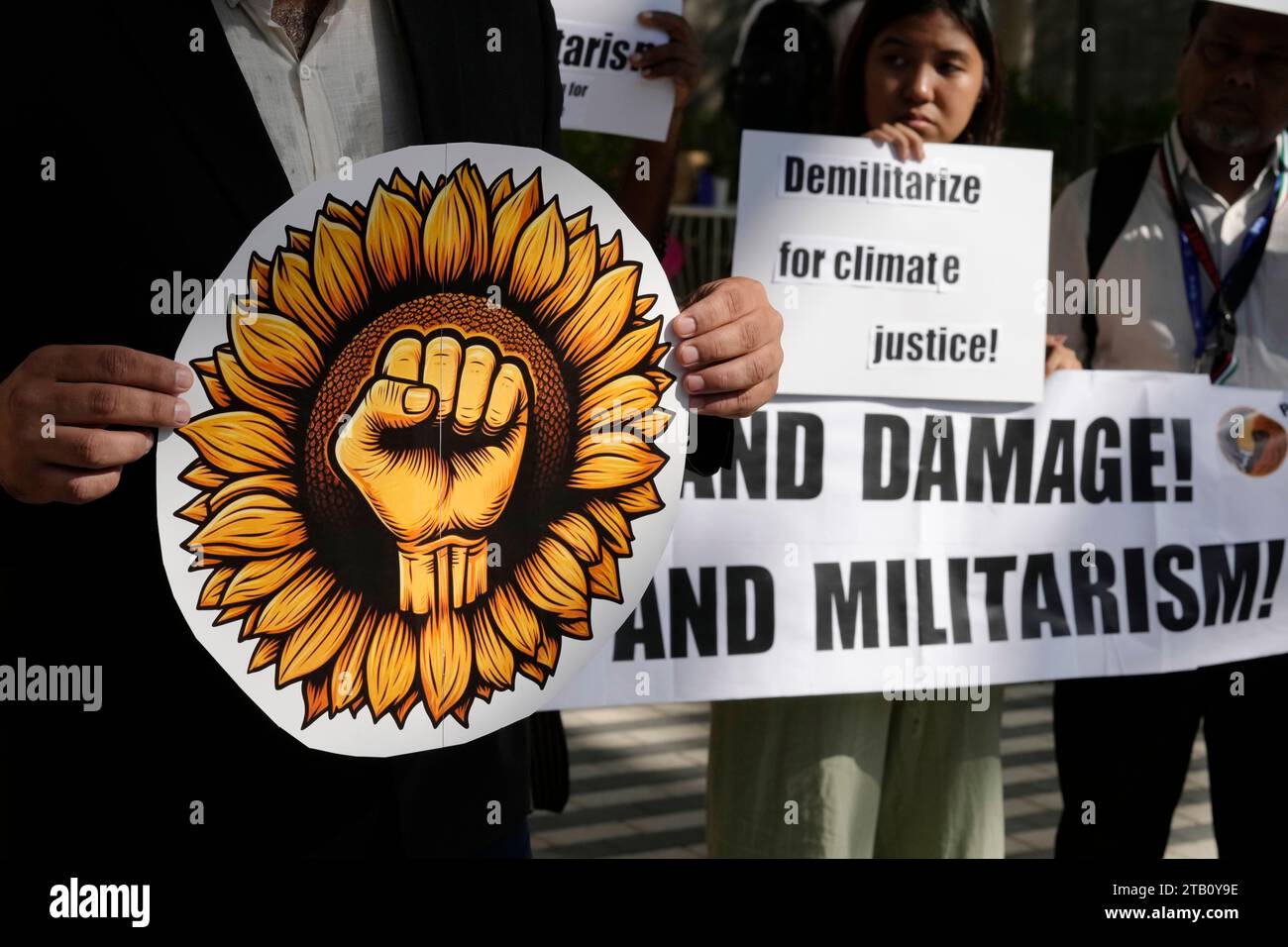 People participate in a demonstration to demilitarize for climate ... People participate in a demonstration to demilitarize for climate ...