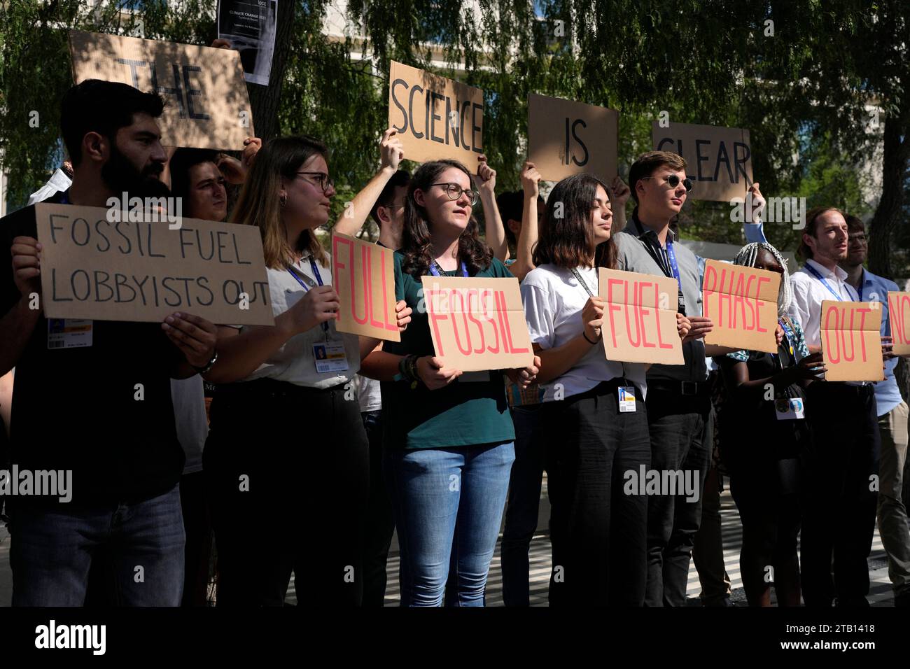 People participate in a protest against fossil fuels at the COP28 U.N ...