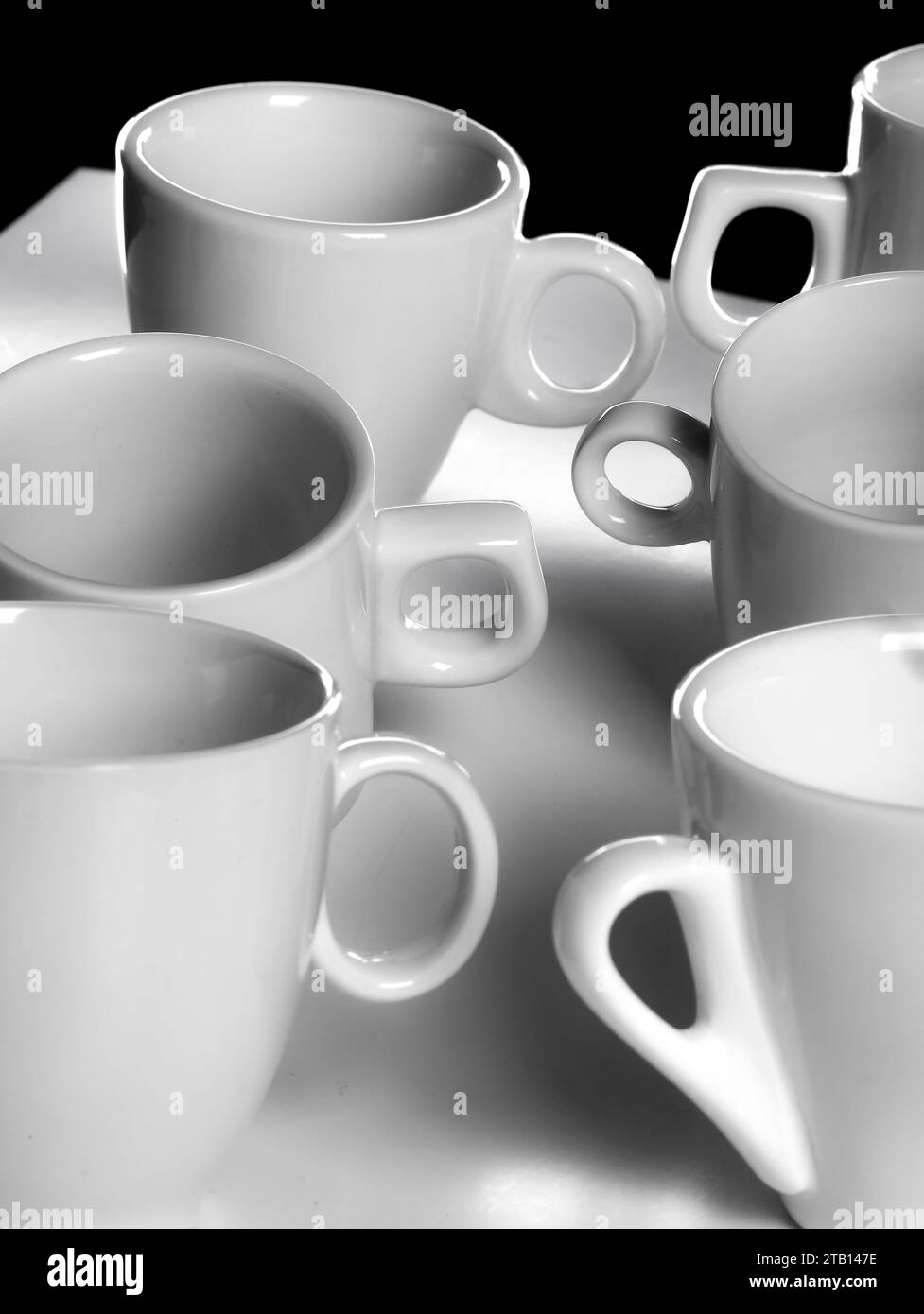White coffee mugs on white background. Creative art concept. Beverage ...