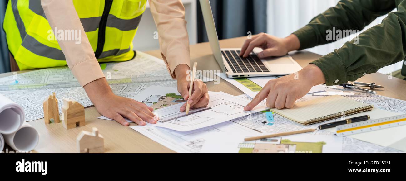 Professional engineer team discussion about house design on meeting ...