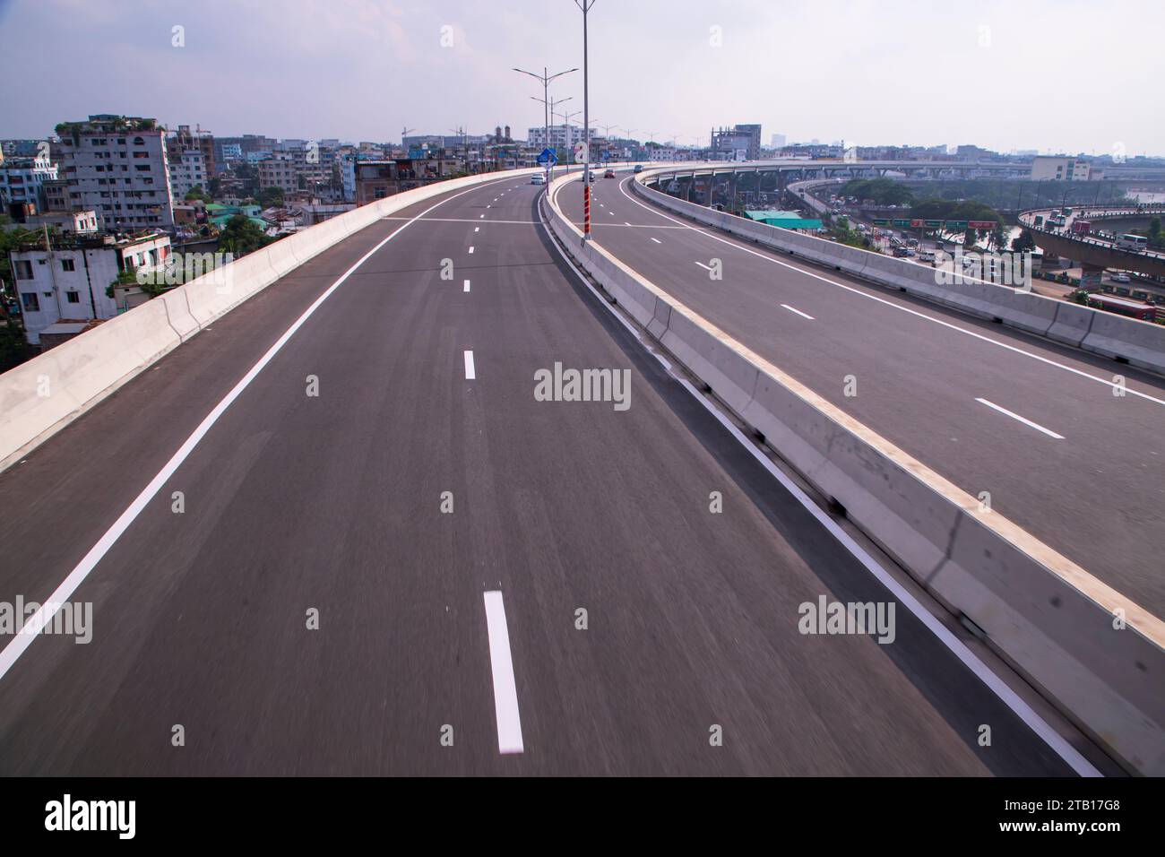 Non-stop speed way Dhaka Elevated Expressway with blue sky view Stock ...
