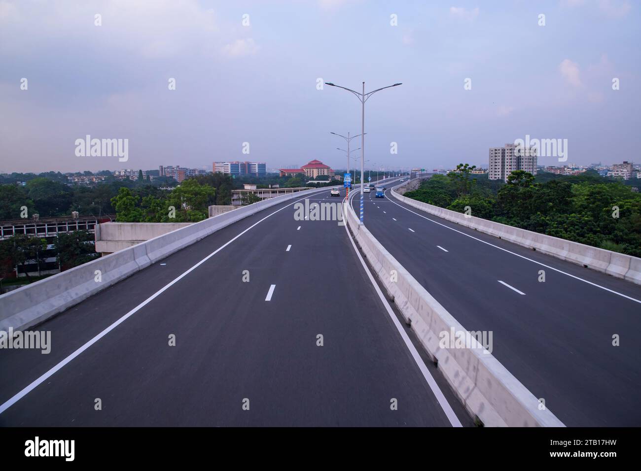 Non-stop speed way Dhaka Elevated Expressway with blue sky view Stock ...
