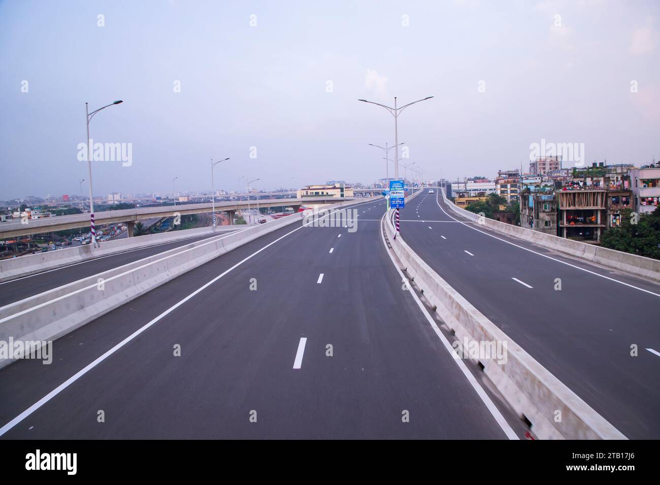 Non-stop speed way Dhaka Elevated Expressway with blue sky view Stock ...