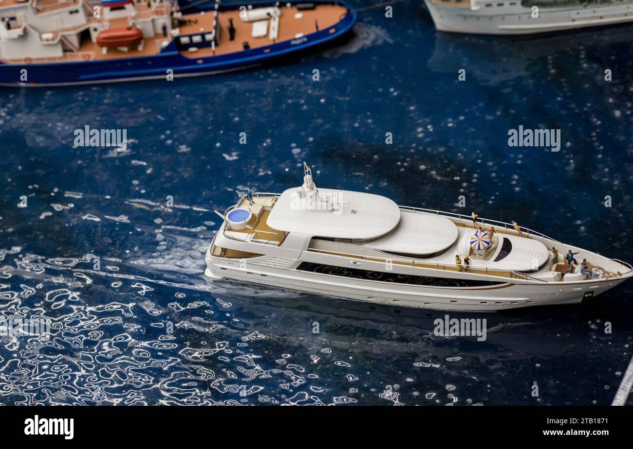 miniature yacht. Rowing boat in the ocean Stock Photo - Alamy