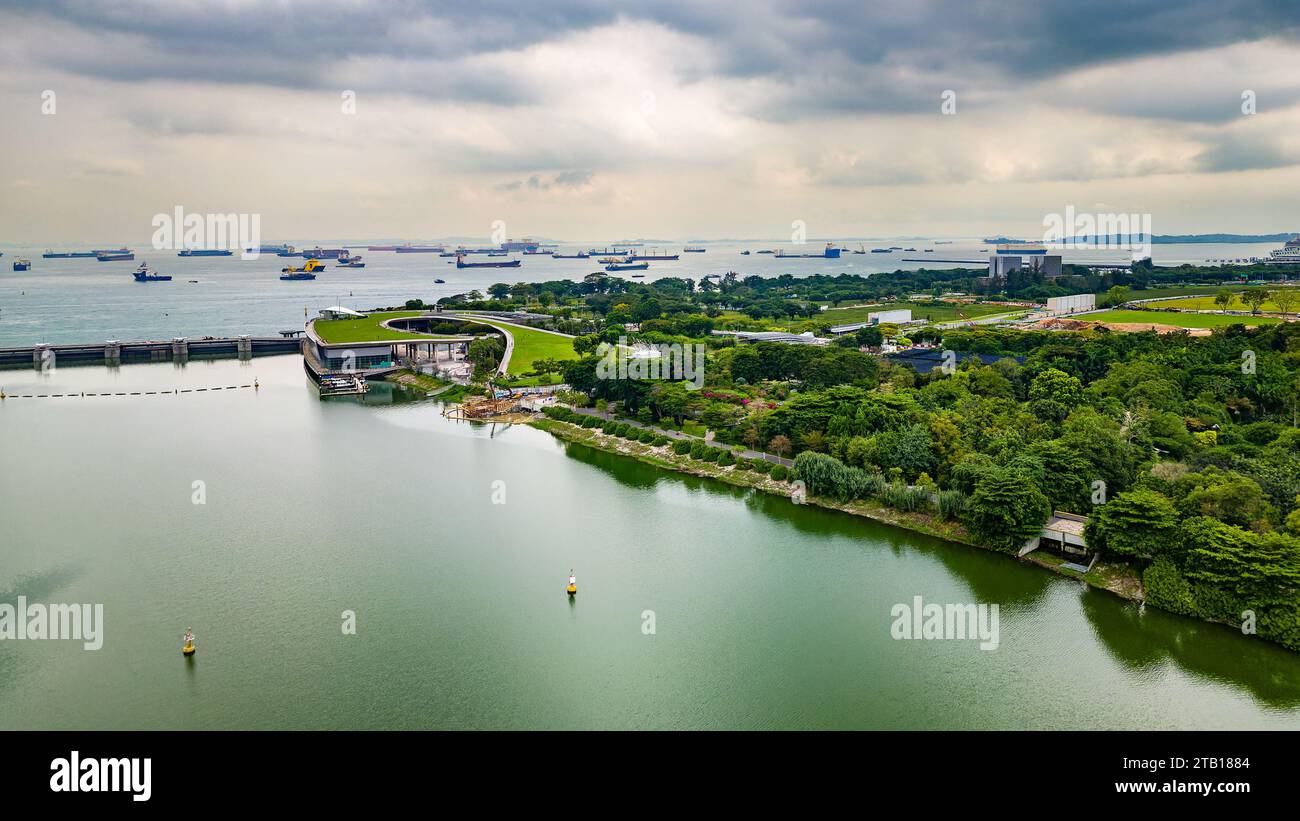 Large numbers of container and tanker ships wait in the strait outside ...