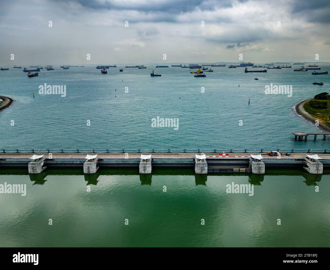 Large amounts of shipping in the strait outside the city of Singapore ...