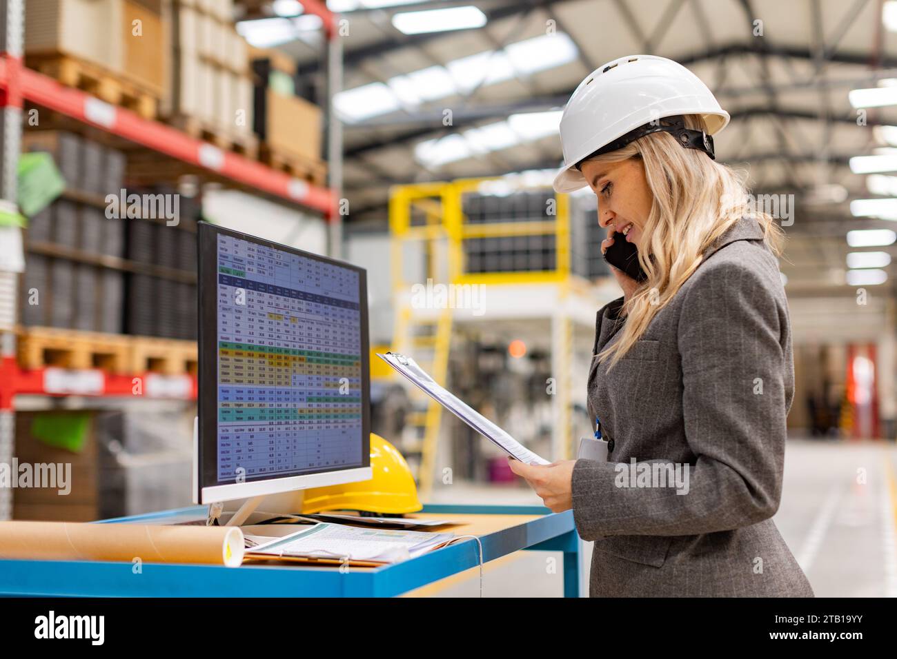 Female engineer, company director, manager in modern industrial factory ...