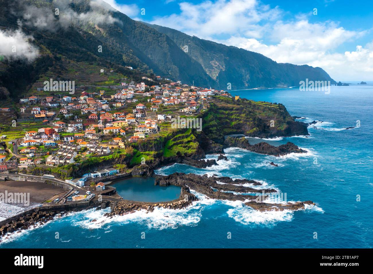 Aerial view of Madeira island. Land meets ocean in Seixal, Madeira ...