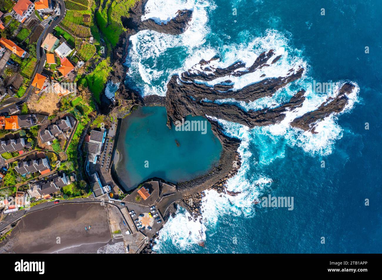 Aerial view of Madeira island. Land meets ocean in Seixal, Madeira ...